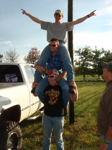 Guys shoulder riding guys